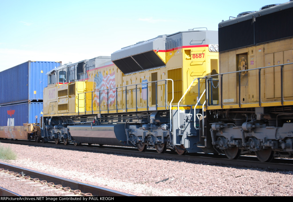UP 8687 Mid Unit DPU behind the Lead UP 8686 heads west on her First Revenue Run out of EMD in ...
